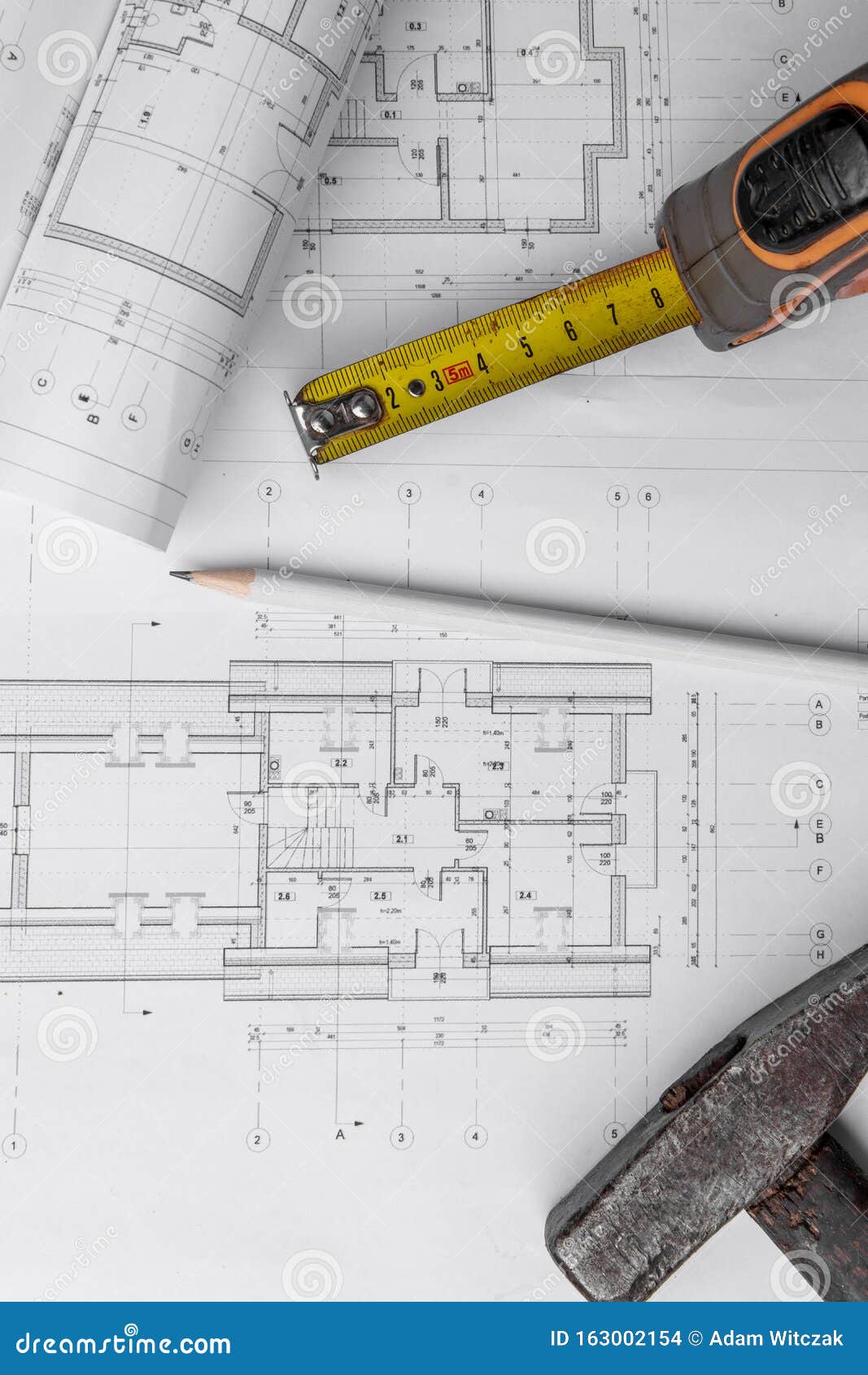 House Construction Plan. Hammer and Measuring Cup. Copy Space Stock ...
