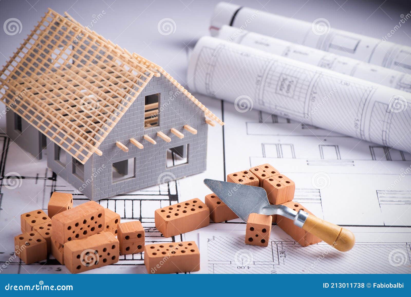 House in Construction - Project with Brick and Blueprint Stock Photo ...