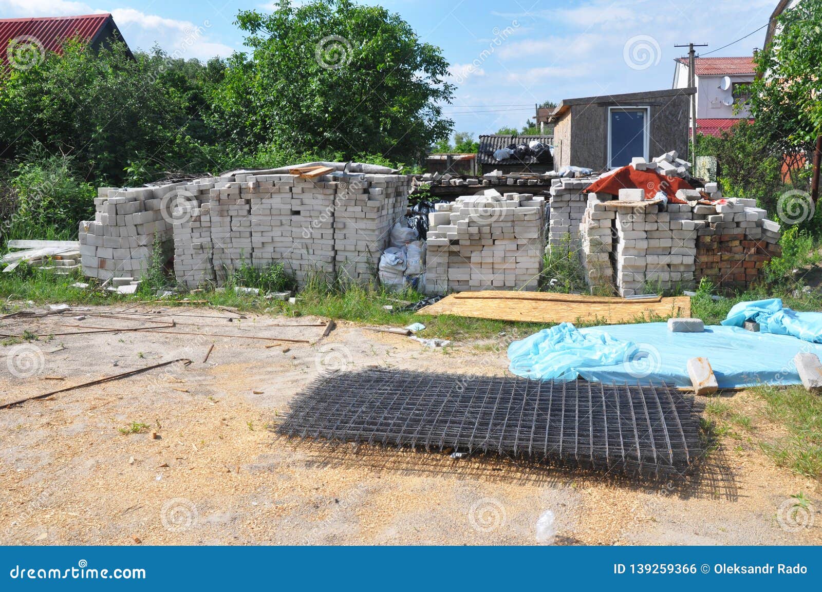 House Construction Site with Building Consctruction Garbage and Stack ...