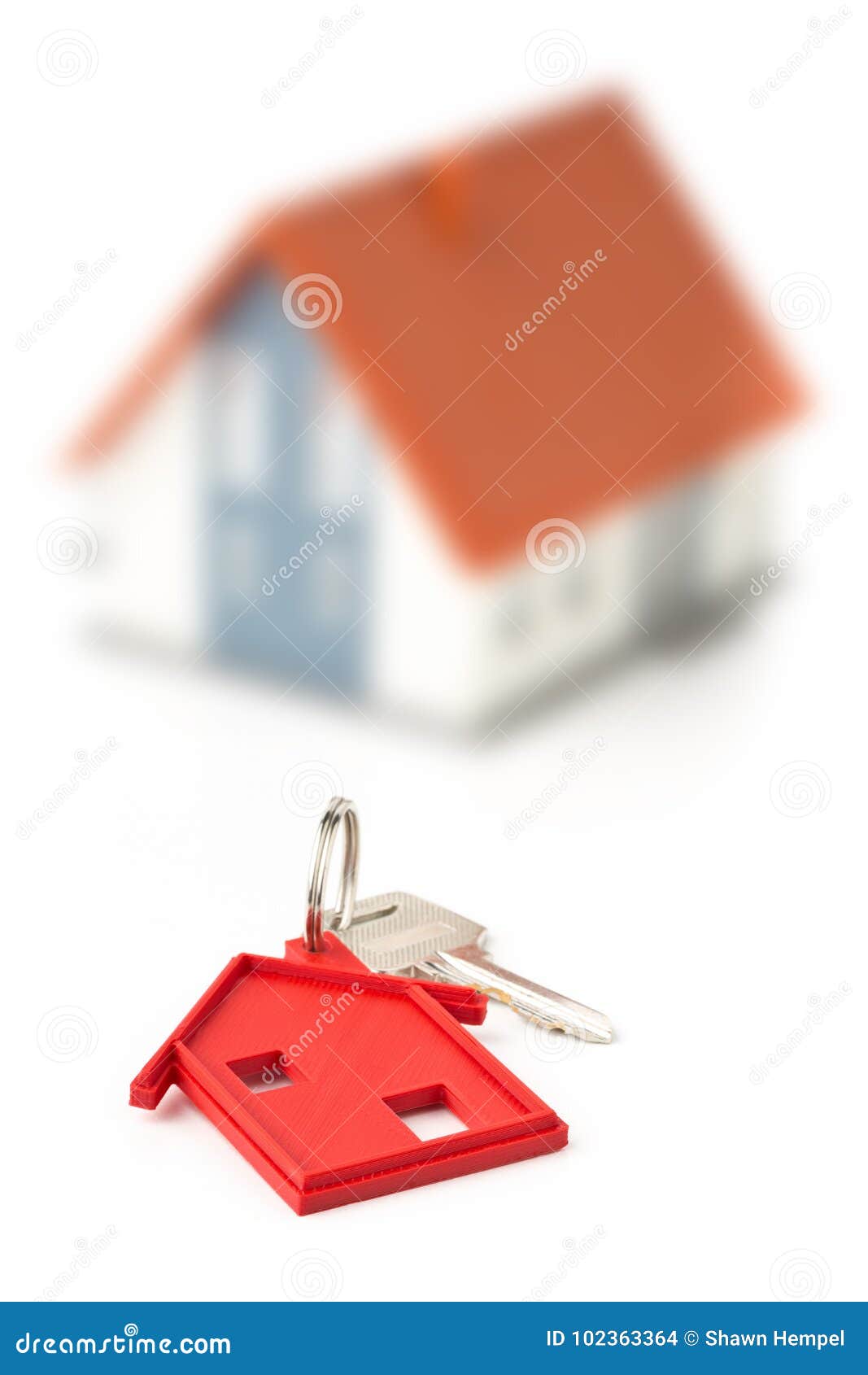 House Door Key with Red House Key Chain Pendant and Model House Stock ...