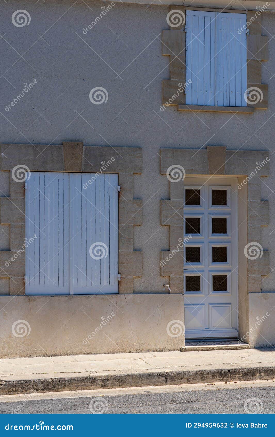 A House with Doors and Two Windows on the Sidewalk Stock Photo - Image ...