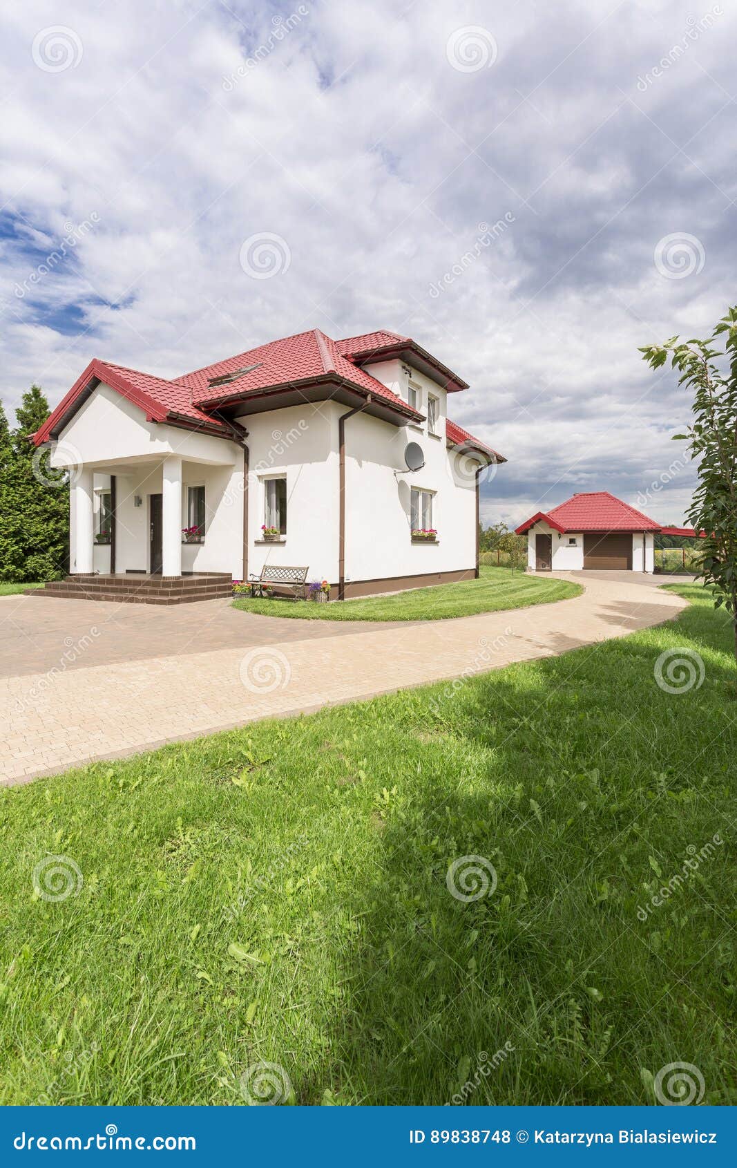 House with a Driveway and a Garage Stock Photo - Image of garden ...