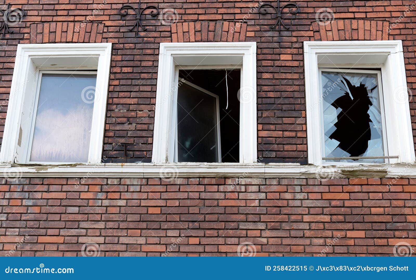 House Facade Made of Goat Bricks with Whole Window, Empty and Broken Window Stock Image - Image ...