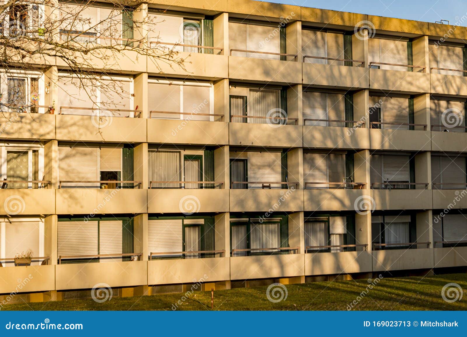 Facade of an Apartment Building at Sunset Stock Image - Image of bright ...