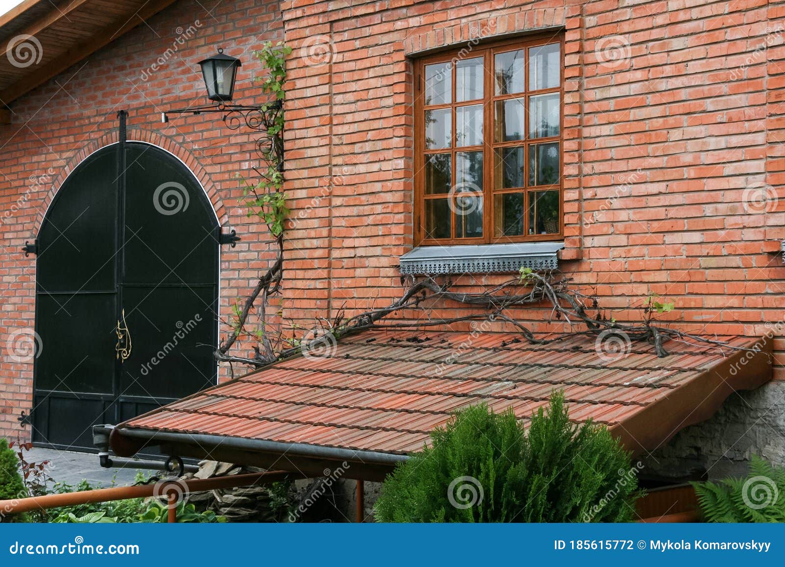 House with gate and window stock photo. Image of facade - 185615772