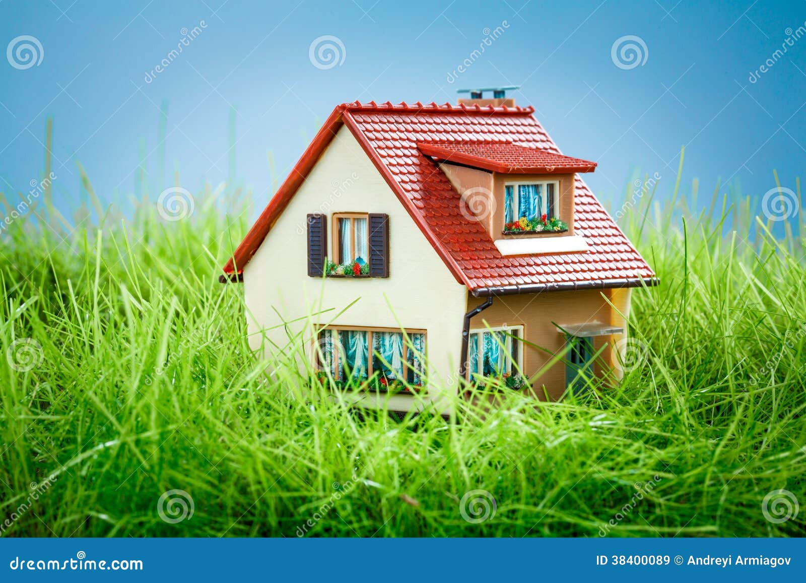 House on the green grass stock image. Image of care, model - 38400089