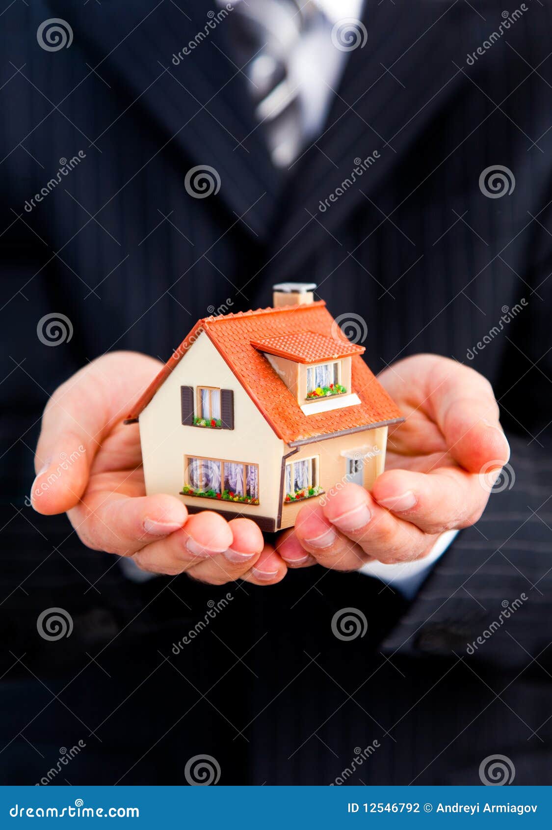 House in a hand stock photo. Image of architect, close - 12546792