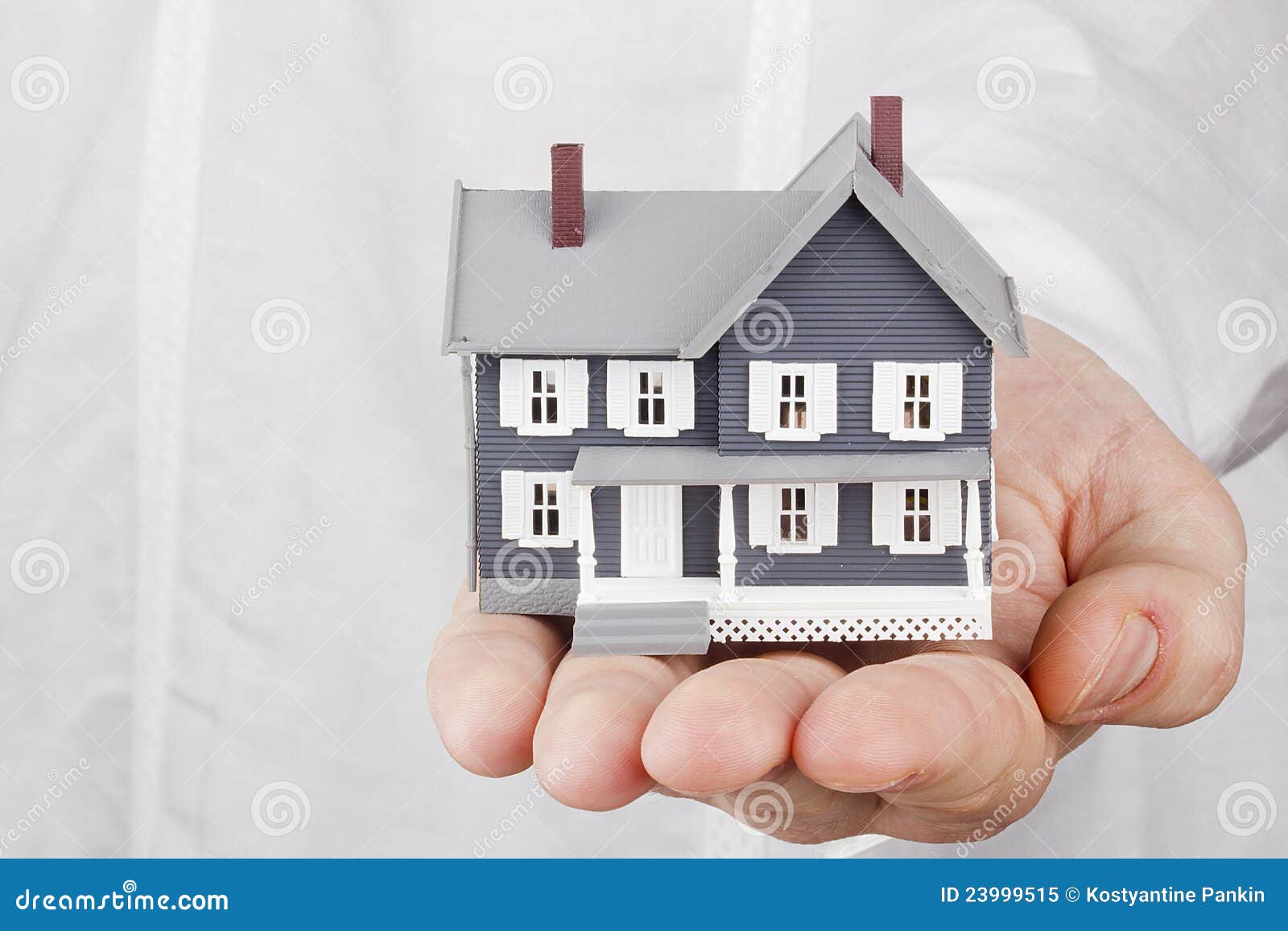 House in a Hand stock image. Image of family, giving - 23999515