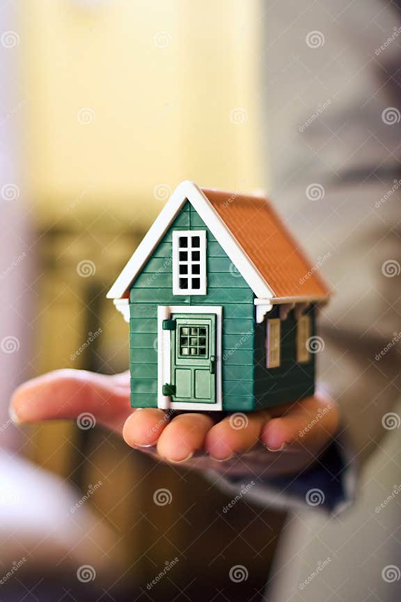 House in hand stock image. Image of metaphor, giving, holding - 3933593