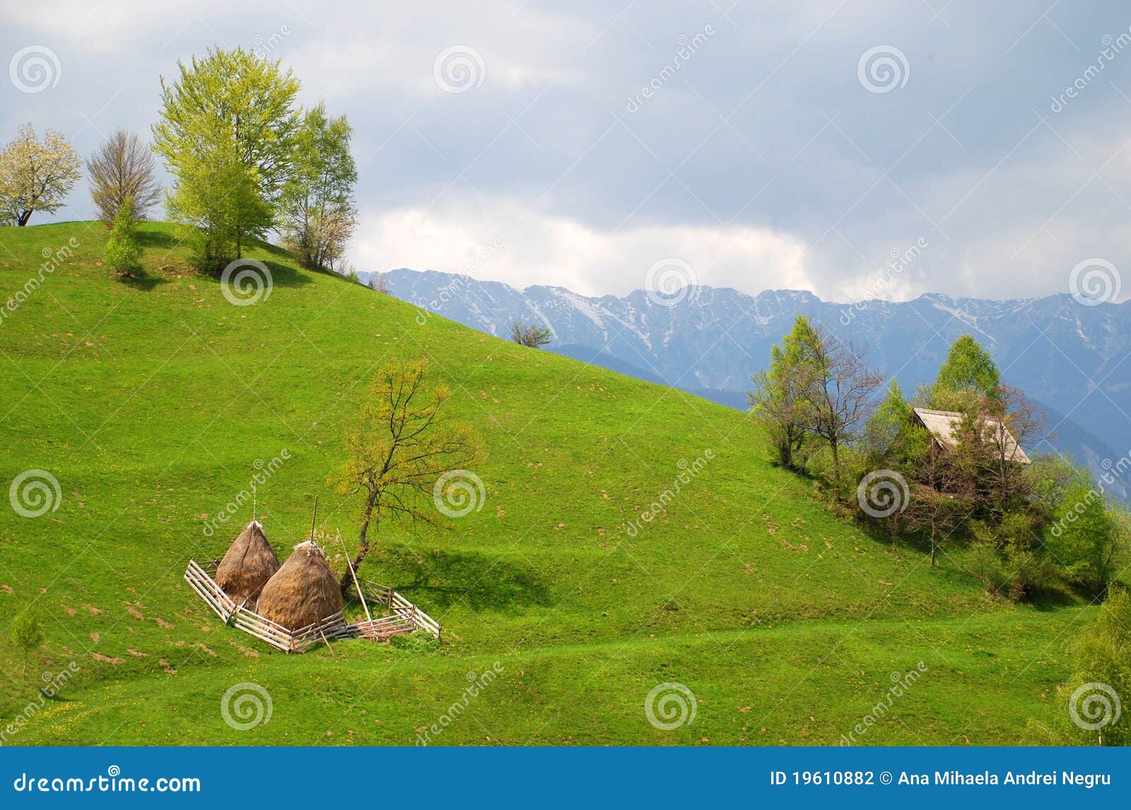 House and Haystacks on Beautiful Hills Stock Photo - Image of land ...