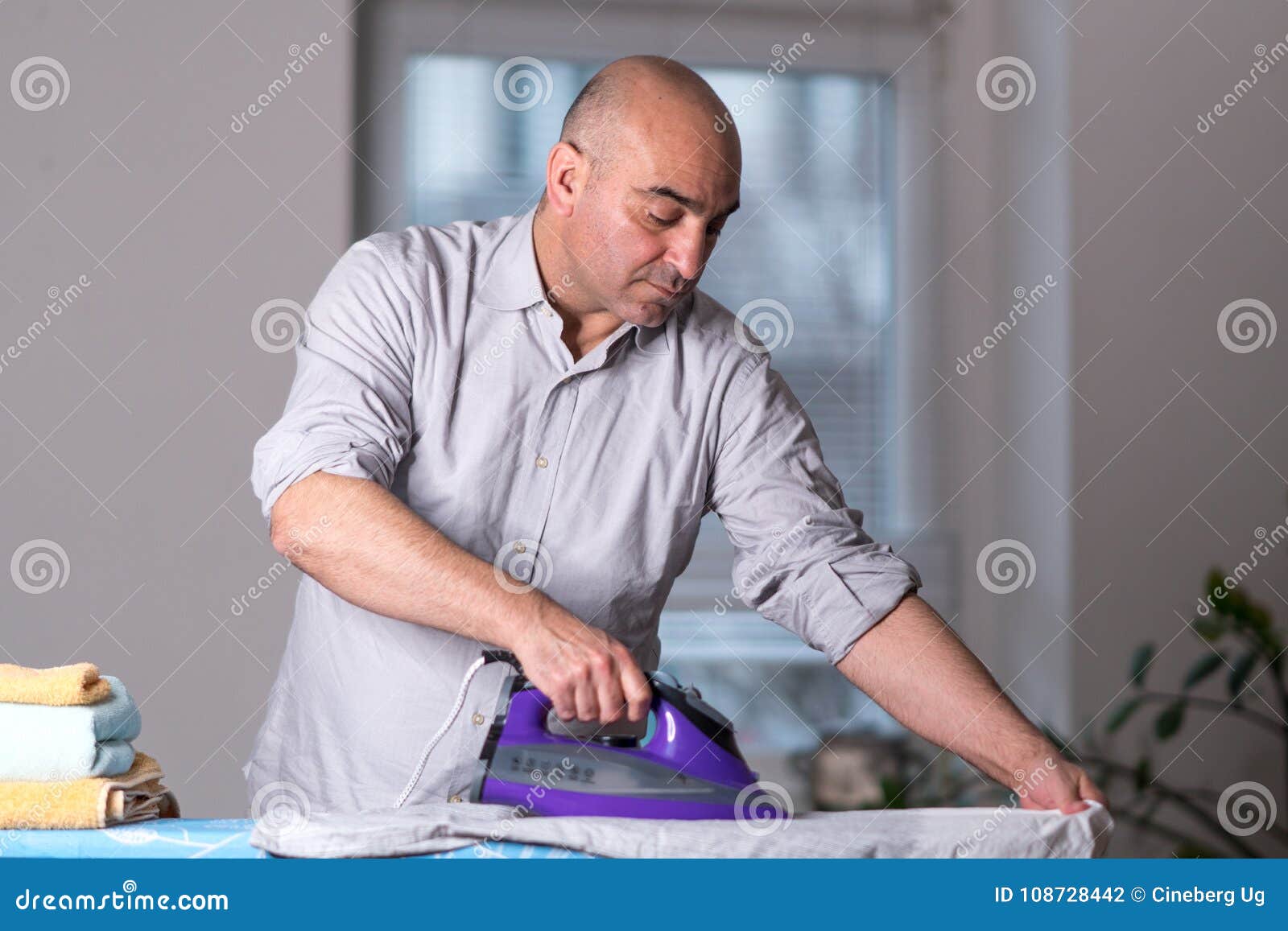 Stay-at-home dad ironing stock photo. Image of gender - 108728442