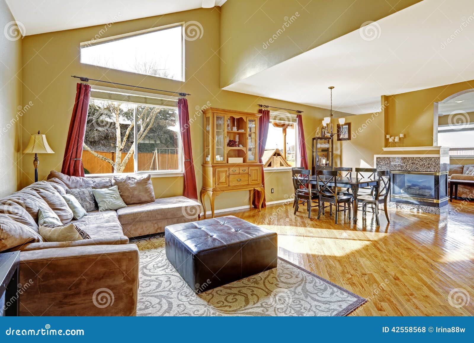 House Interior. Bright Living Room with Dining Area and Fireplace Stock ...