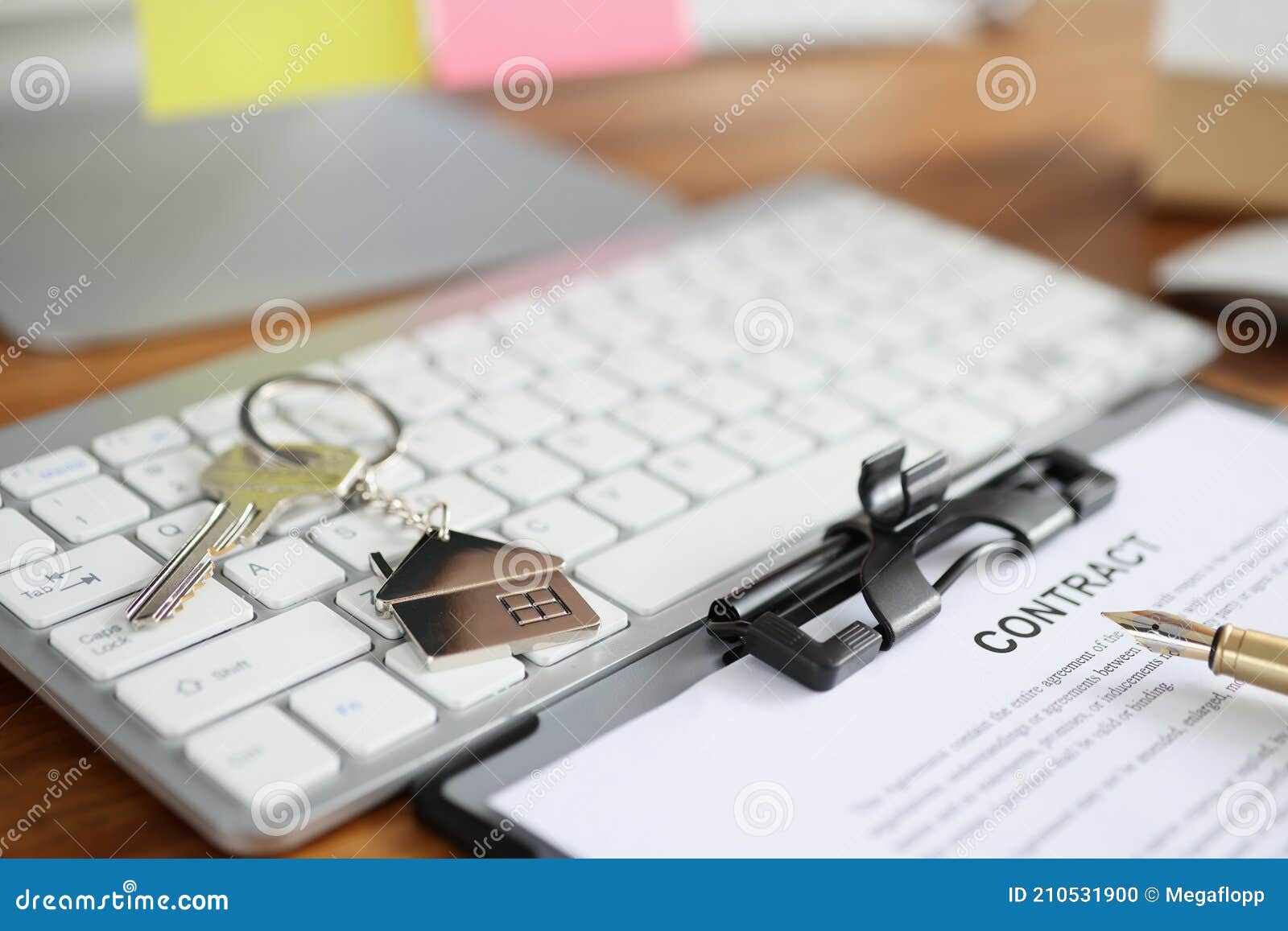 House Keys and Document with Contract Lying on Keyboard Closeup Stock ...