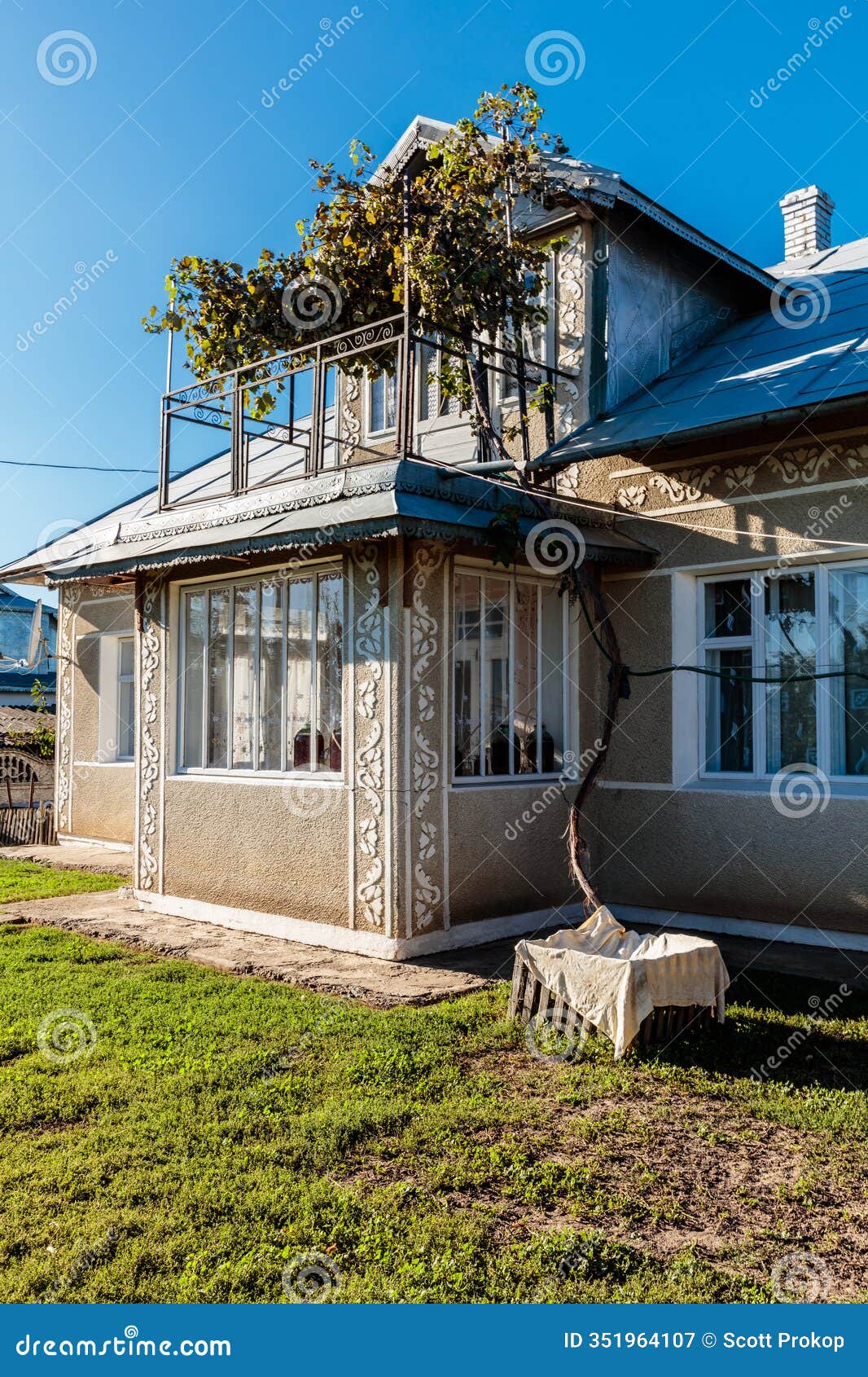 A House with a Large Tree in Front of it Stock Image - Image of balcony ...