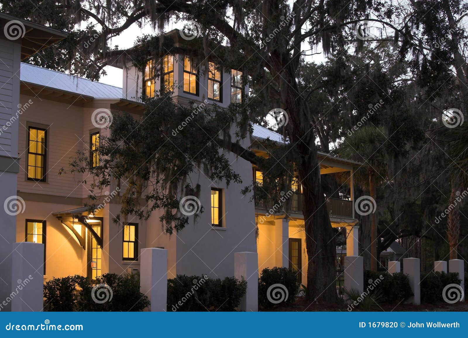 House lit up at twilight stock photo. Image of outside - 1679820