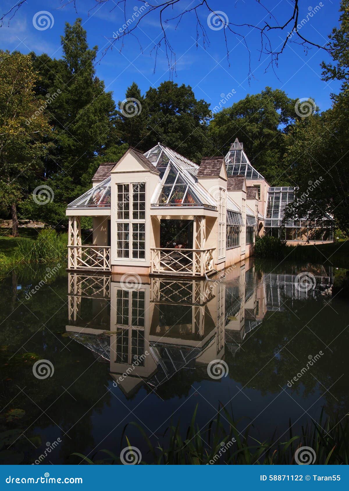 House near water; evening stock photo. Image of water - 58871122