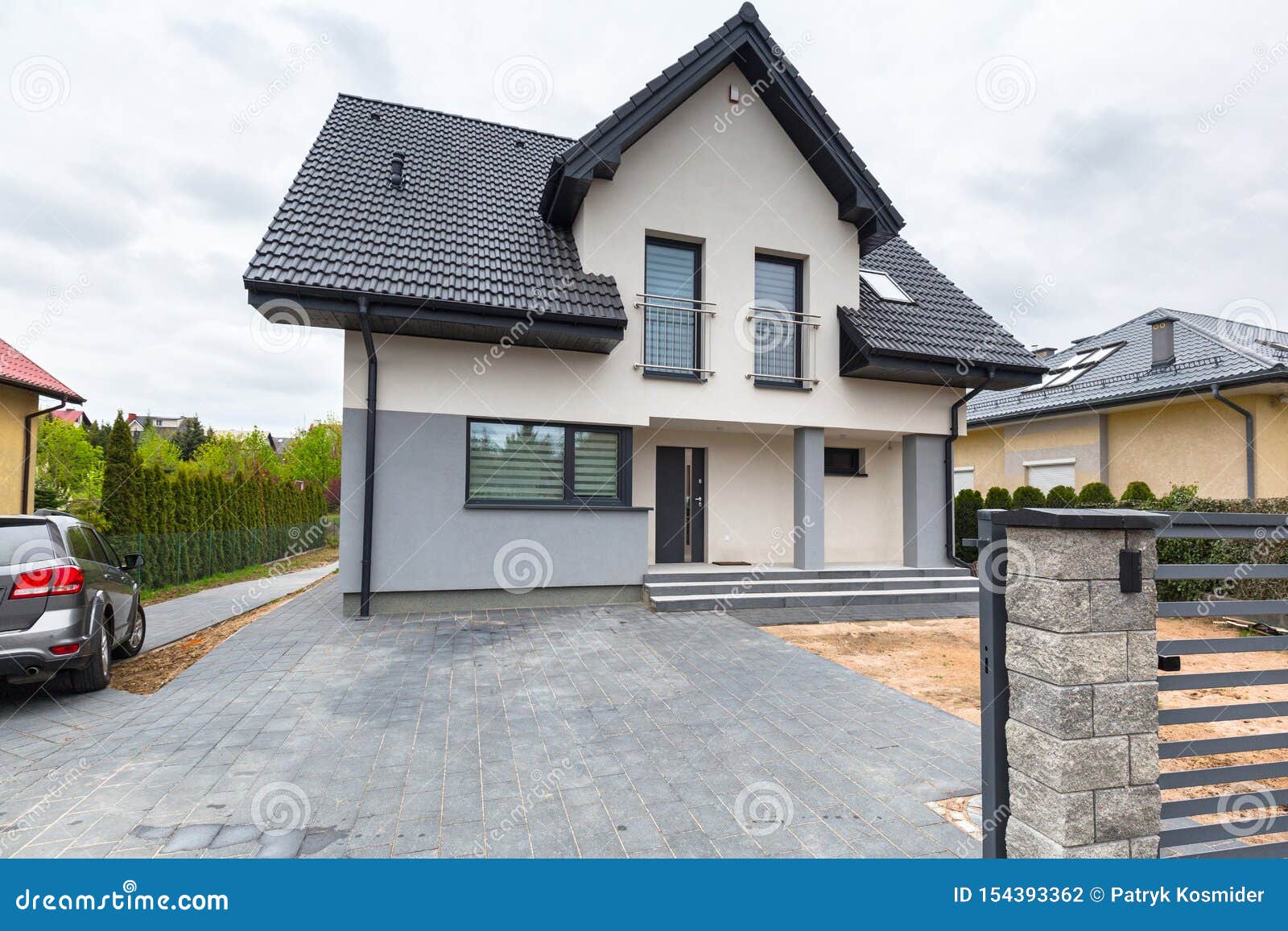 House with Concrete Paver Blocks Stock Photo - Image of gray, path ...