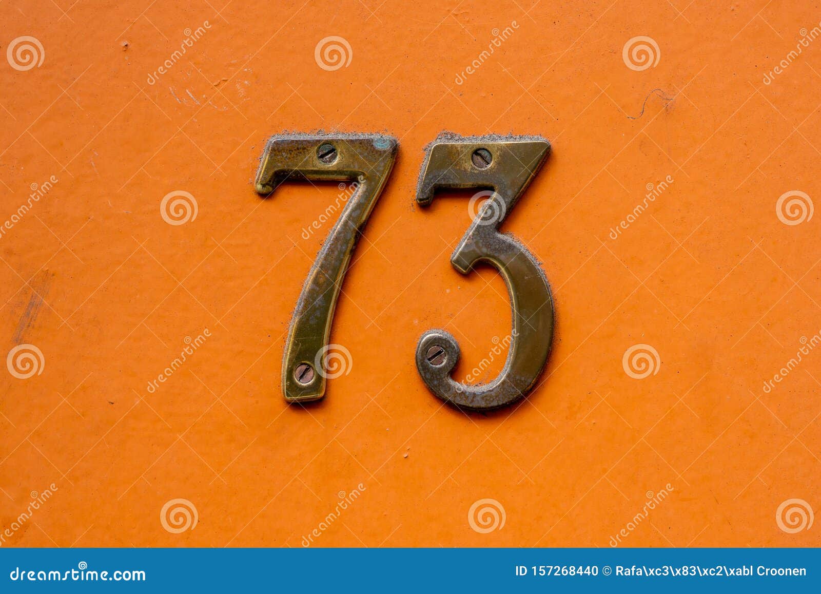 House number 73 stock photo. Image of cast, outdoors - 157268440
