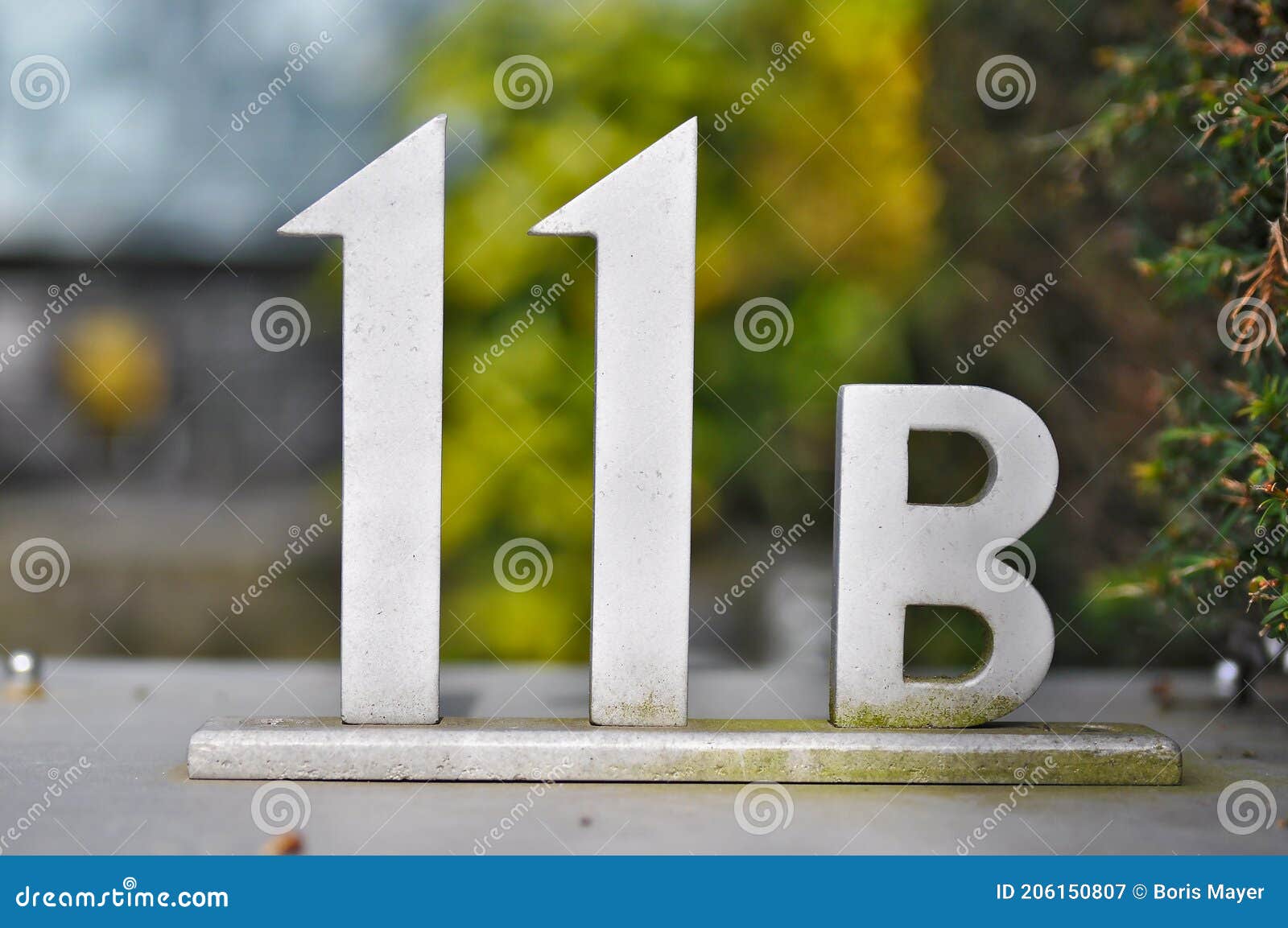 A House Number Plaque, Showing the Number Eleven B 11 B Stock Image ...
