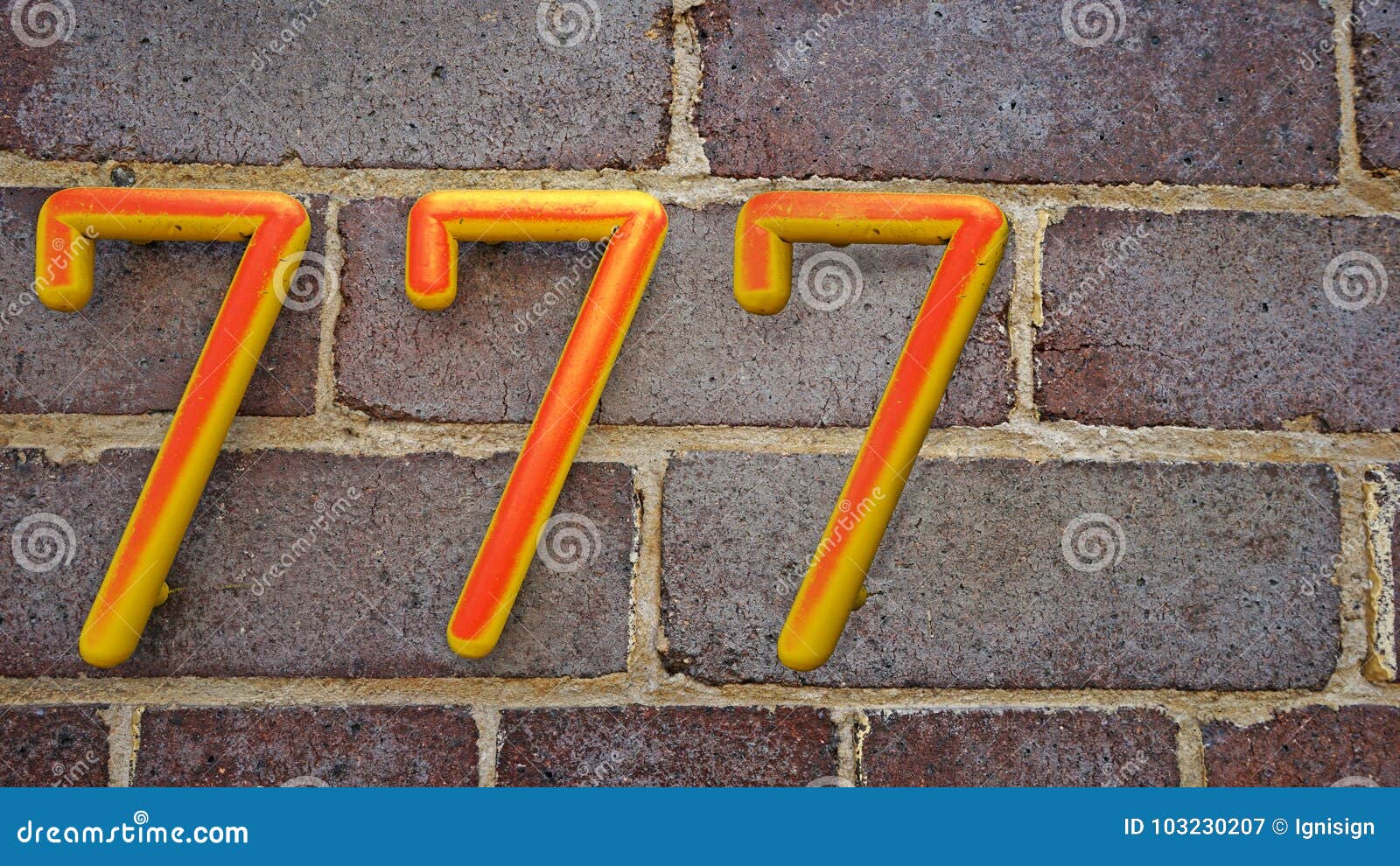 House Number Seven Hundred and Seventy Seven 777 on Brick Wall ...