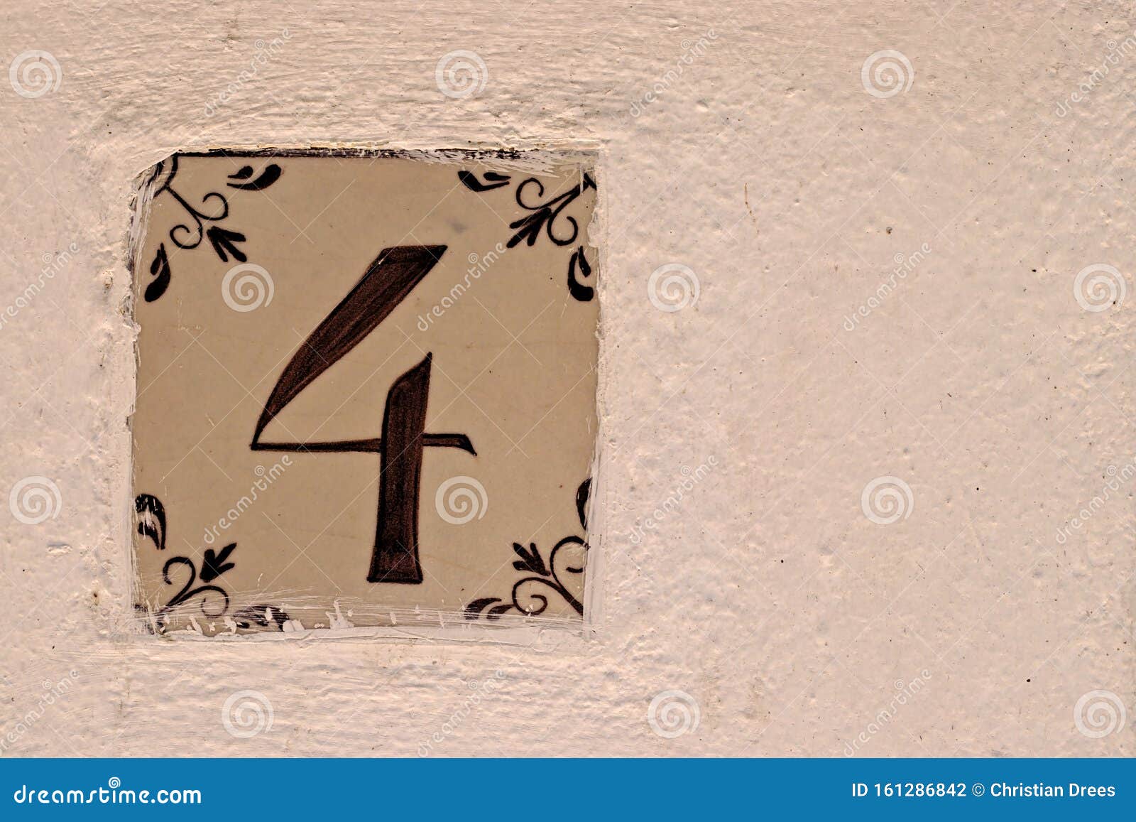 House Number Sign Number 4 on a Wall Stock Photo - Image of wall, sign ...