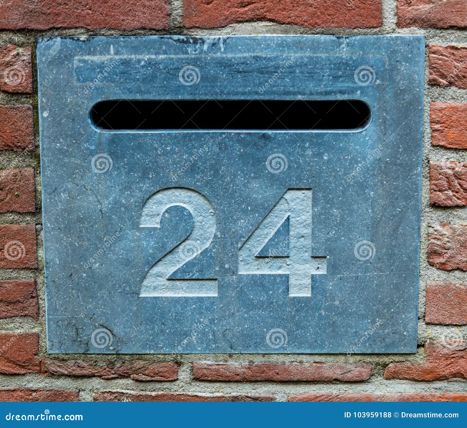 House number 24 in stone stock photo. Image of cement - 103959188