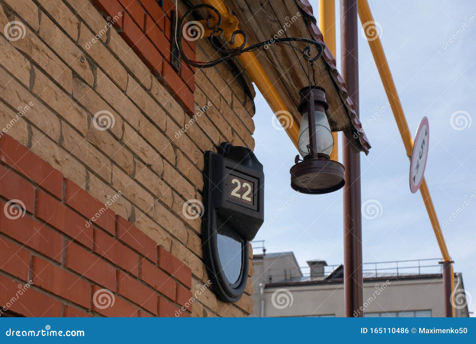 House Number 22 Written in White on a Modern Plastic Plaque on Brick ...
