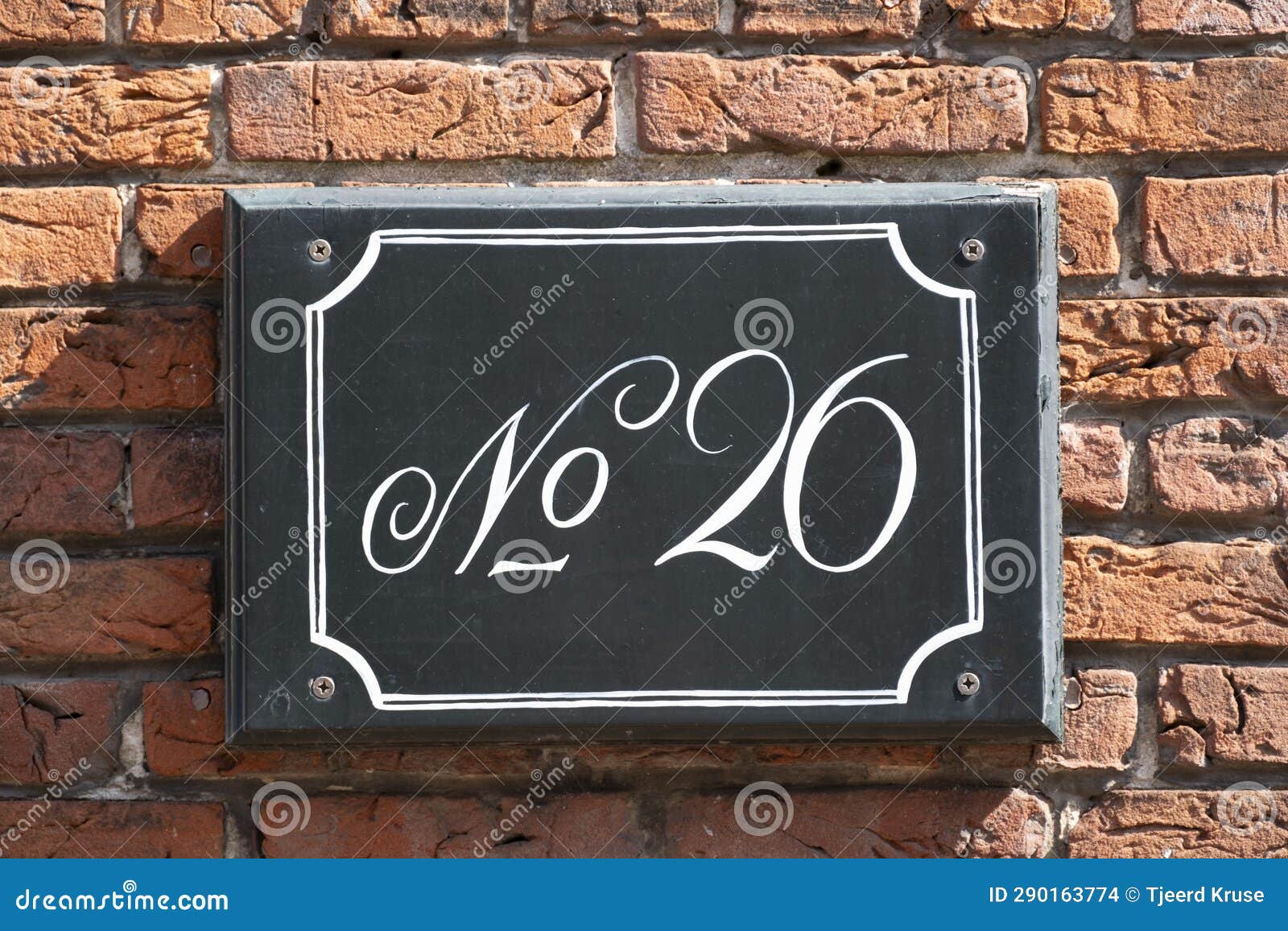 House Number 26 on a Yellow Brick Wall Stock Photo - Image of wall ...