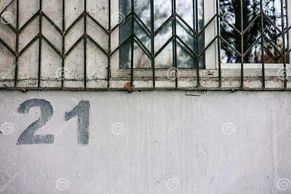 House Numbering. the Number 21 Twenty One is Painted Using a Stencil on ... House Numbering. the Number 21 Twenty One is Painted Using a Stencil on ...