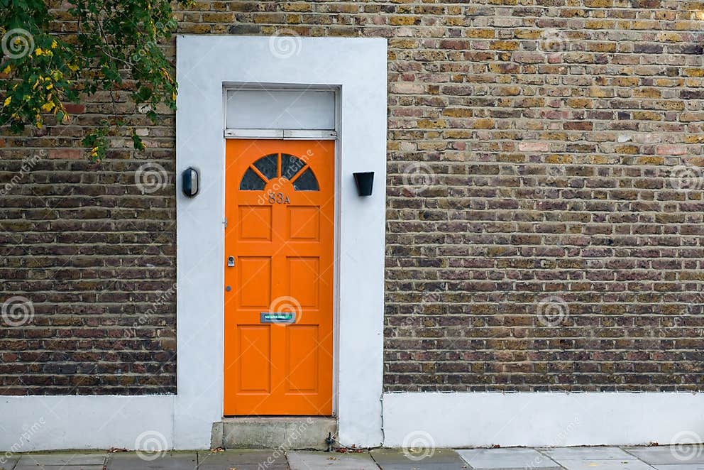 House with orange door stock image. Image of front, home - 9219561