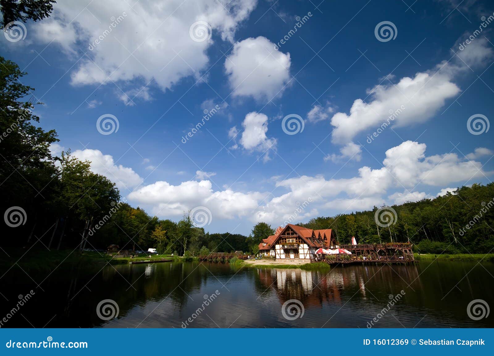 House by picturesque lake stock image. Image of house - 16012369