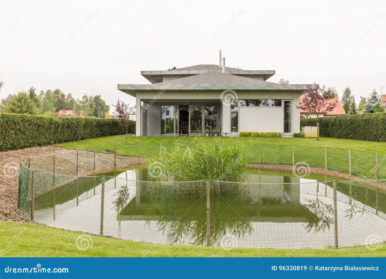 House with pond stock image. Image of suburbs, town, hedgerow - 96330819