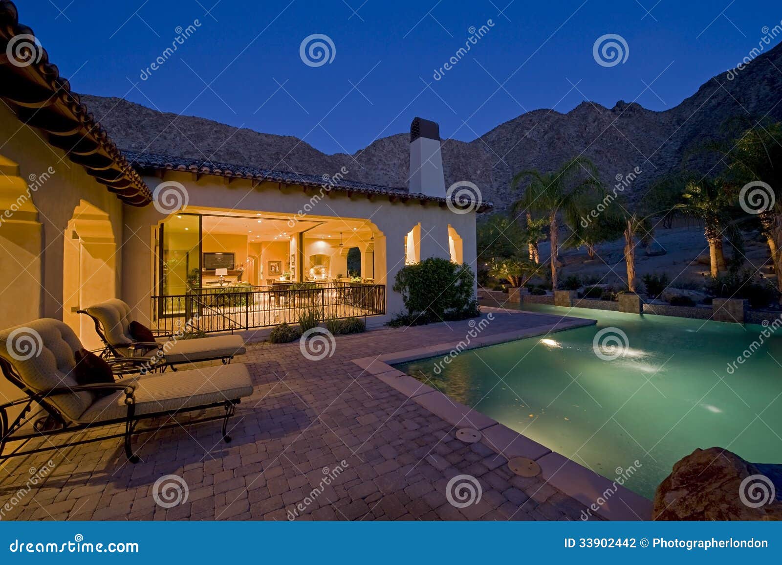 House with Pool in Backyard at Dusk Stock Photo - Image of mountain ...