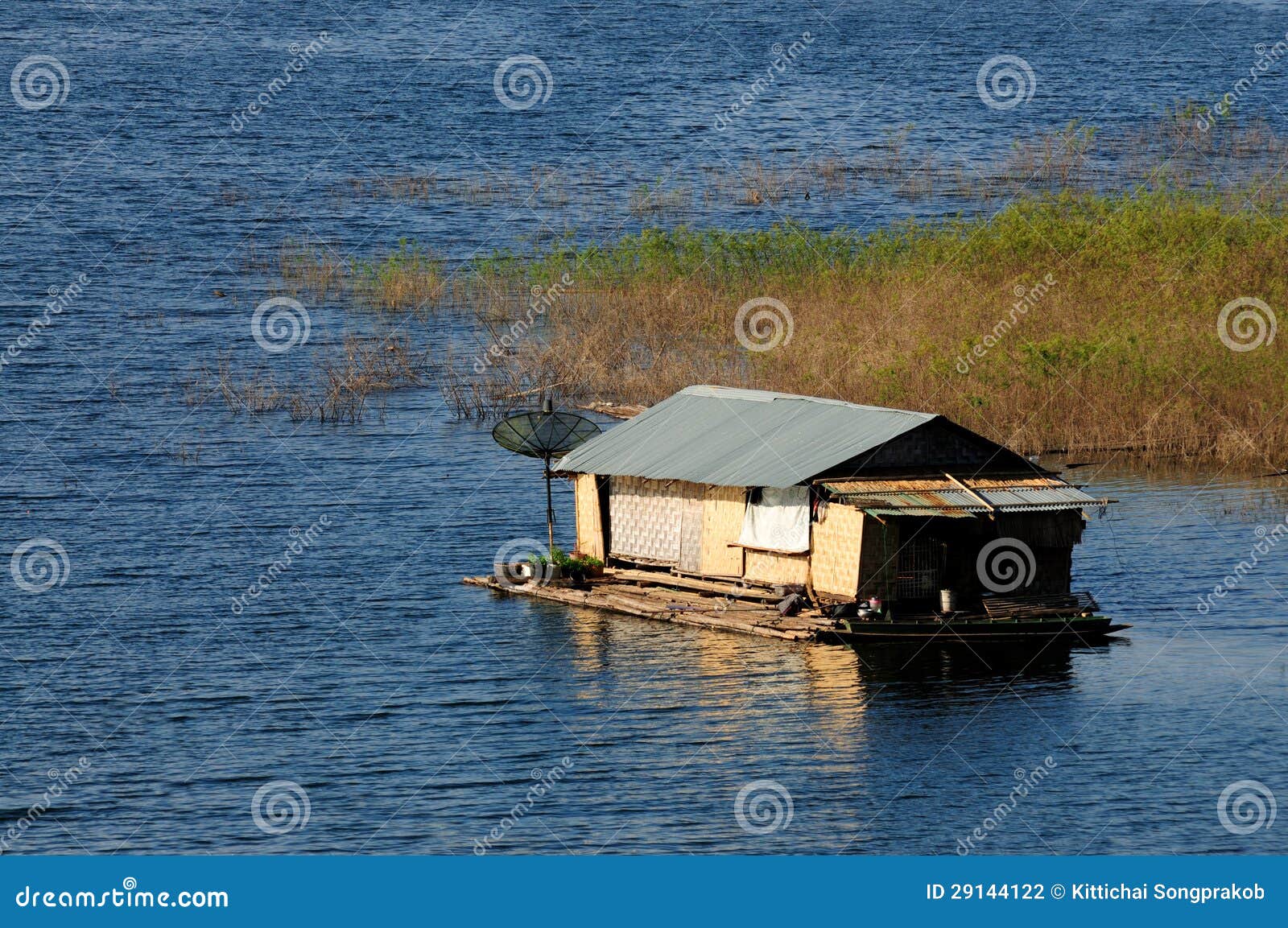 House on raft in the lake stock photo. Image of cliff - 29144122