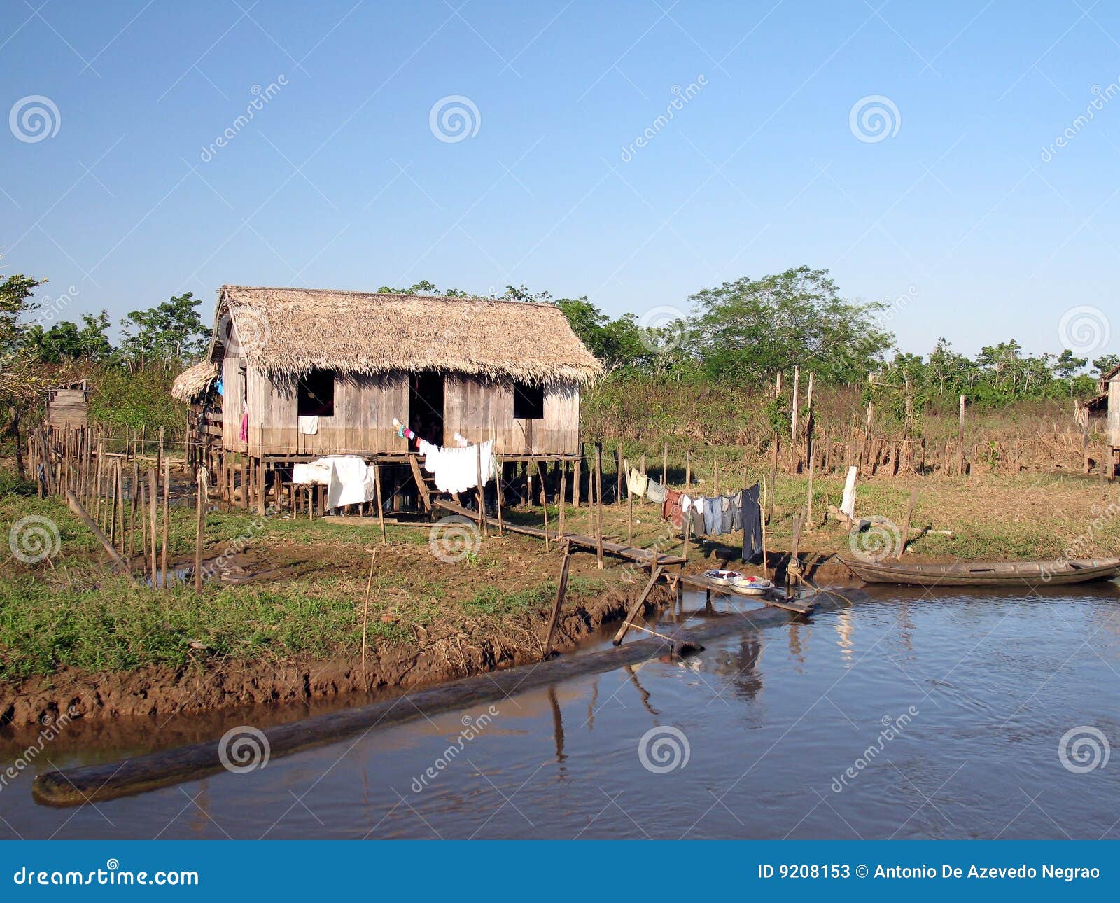 House in river stock image. Image of community, home, exotic - 9208153