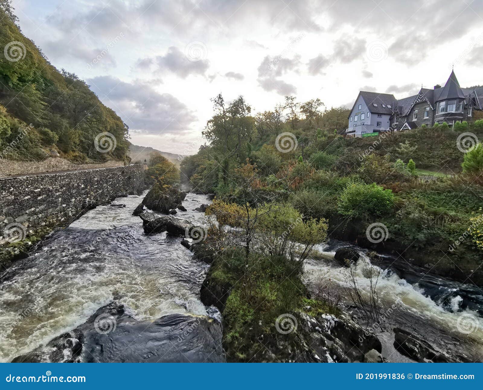 A house on a river bunk stock photo. Image of mountain - 201991836