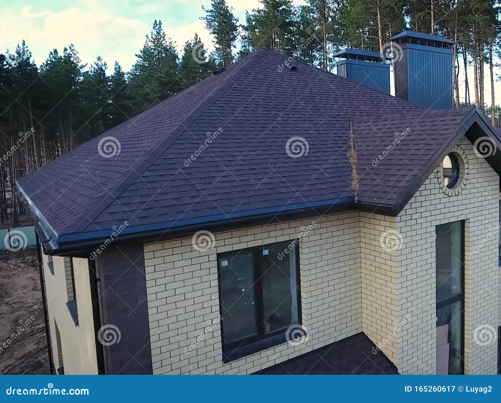 Bituminous Tile for a Roof. House with a Roof from a Bituminous Stock ...