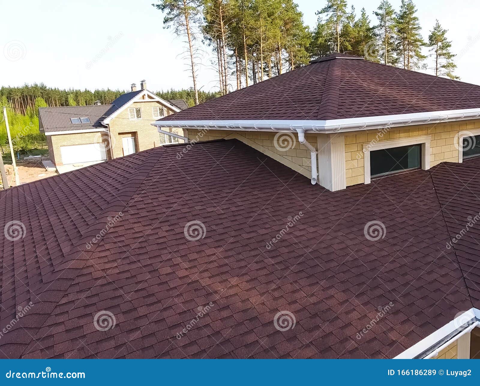 Bituminous Tile for a Roof. House with a Roof from a Bituminous Stock ...