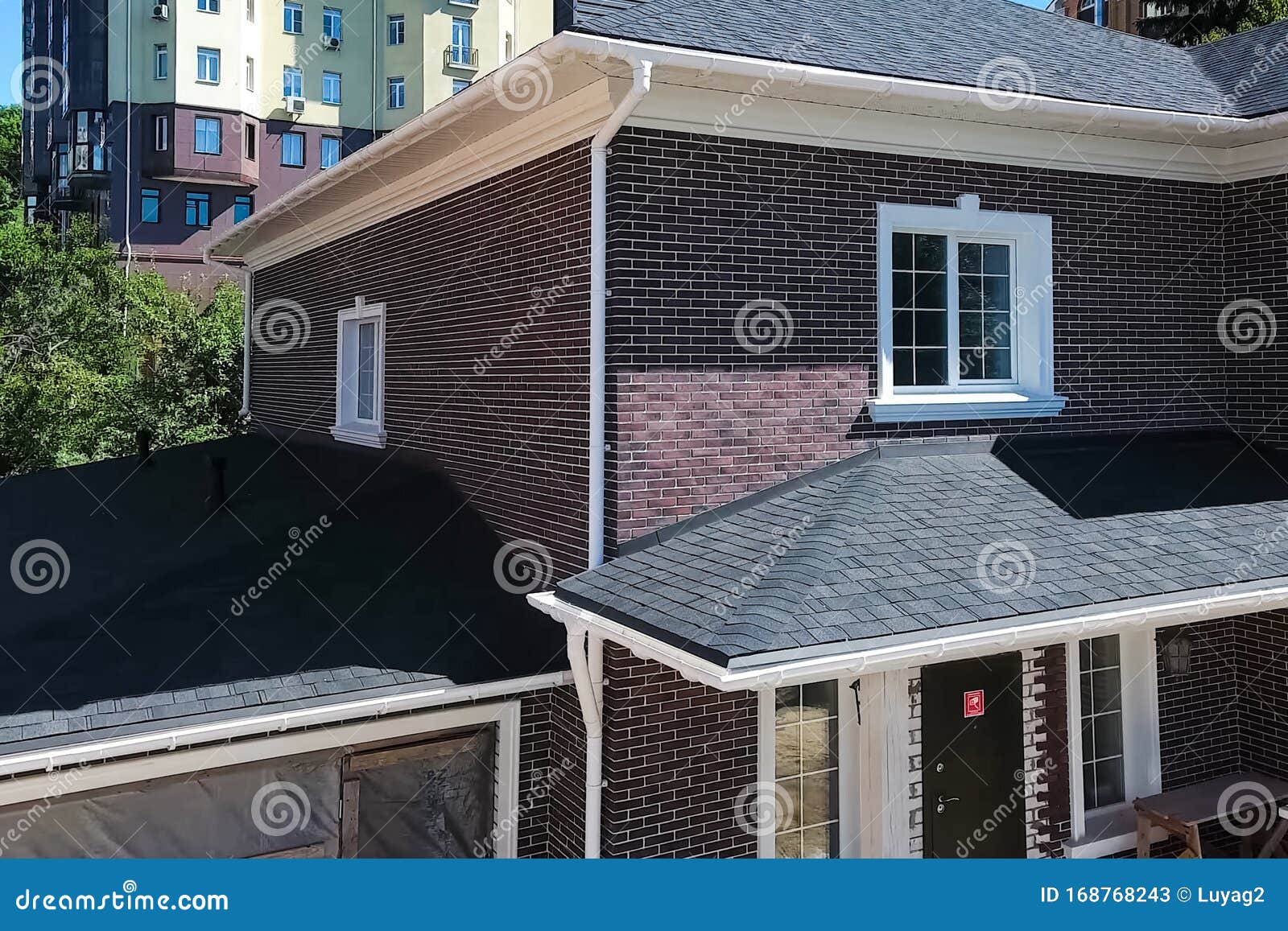 Bituminous Tile for a Roof. House with a Roof from a Bituminous Stock ...