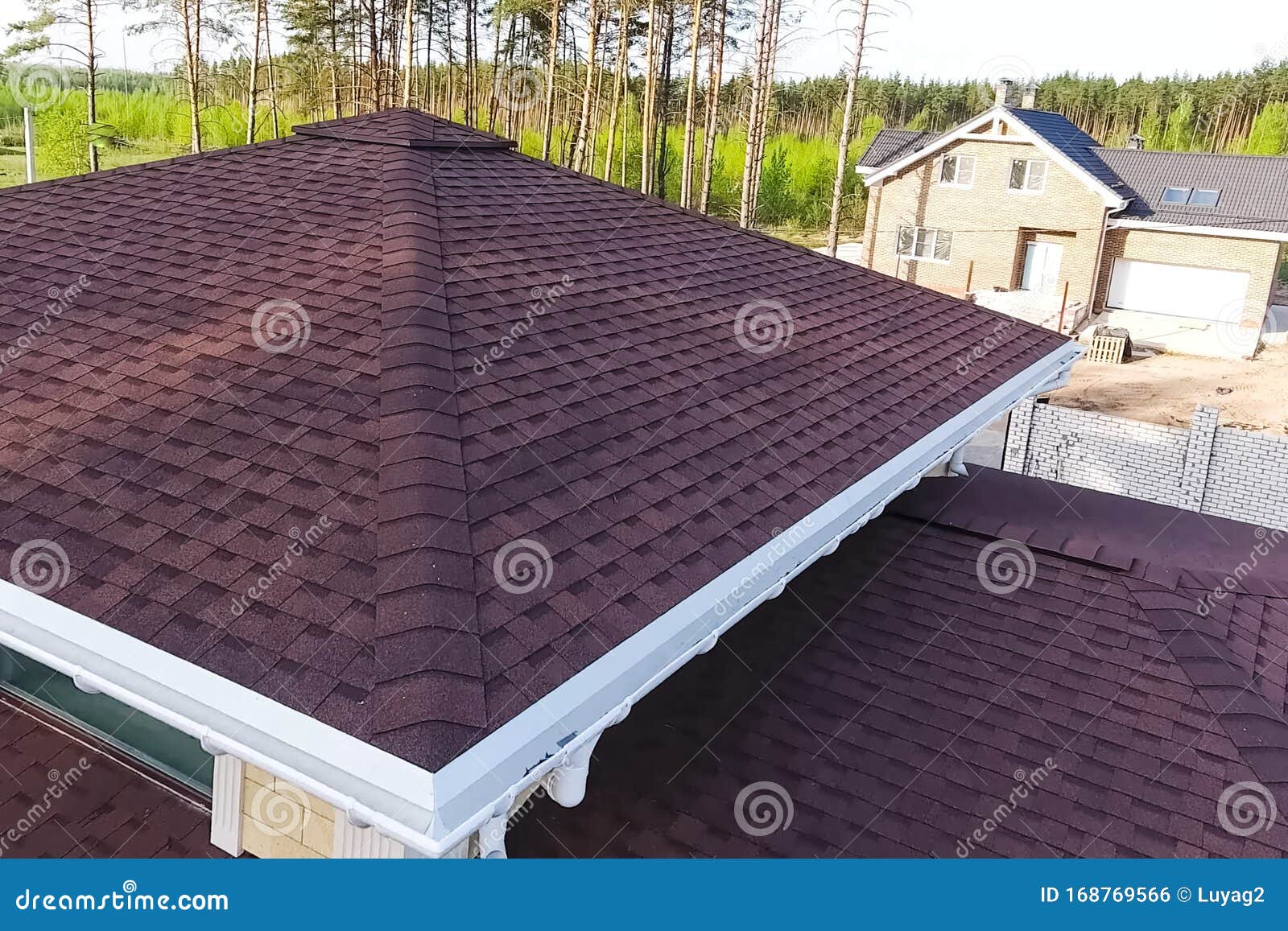 Bituminous Tile for a Roof. House with a Roof from a Bituminous Stock ...
