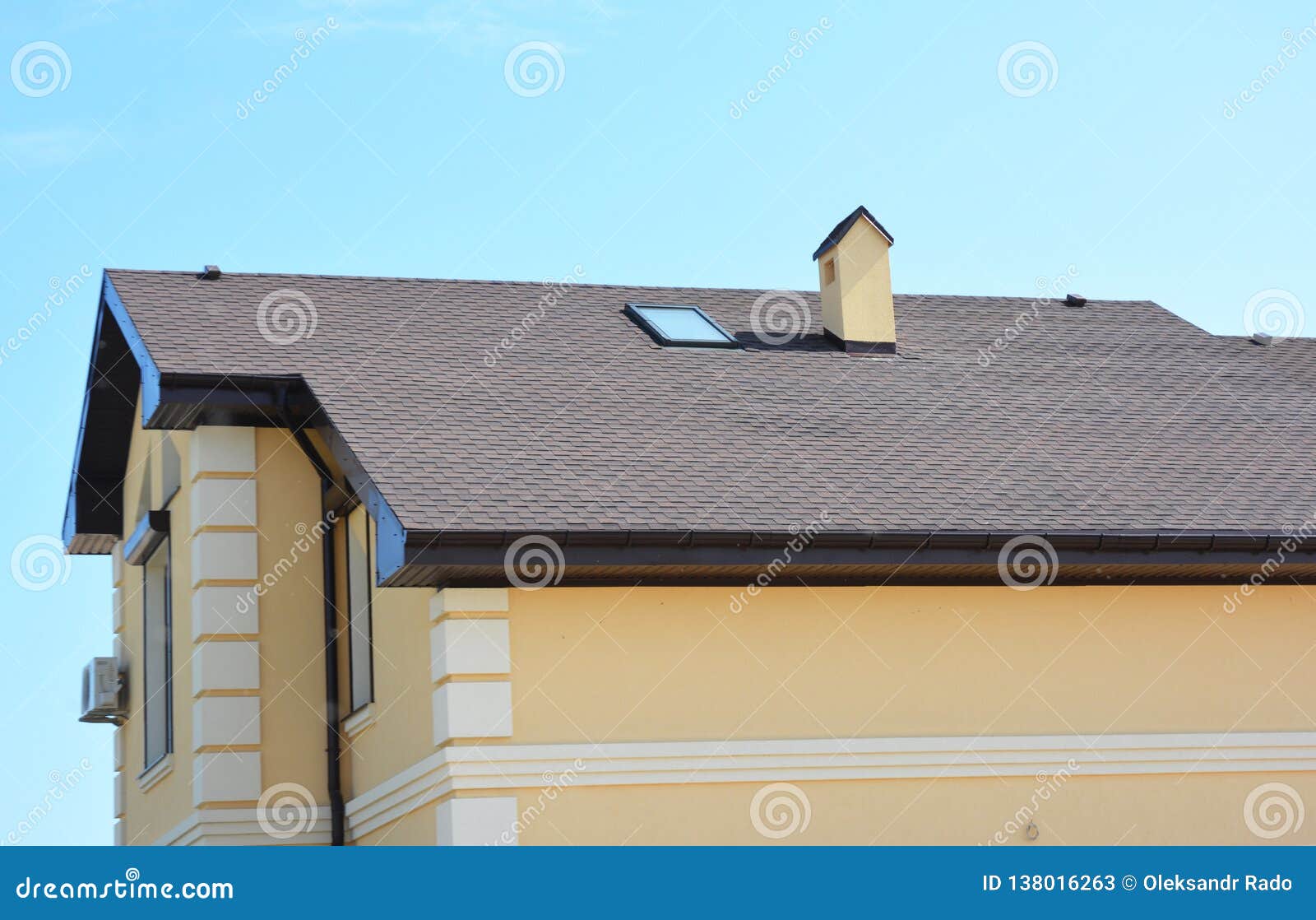 House Roofing Construction with Asphalt Shingles and Skylight Window ...