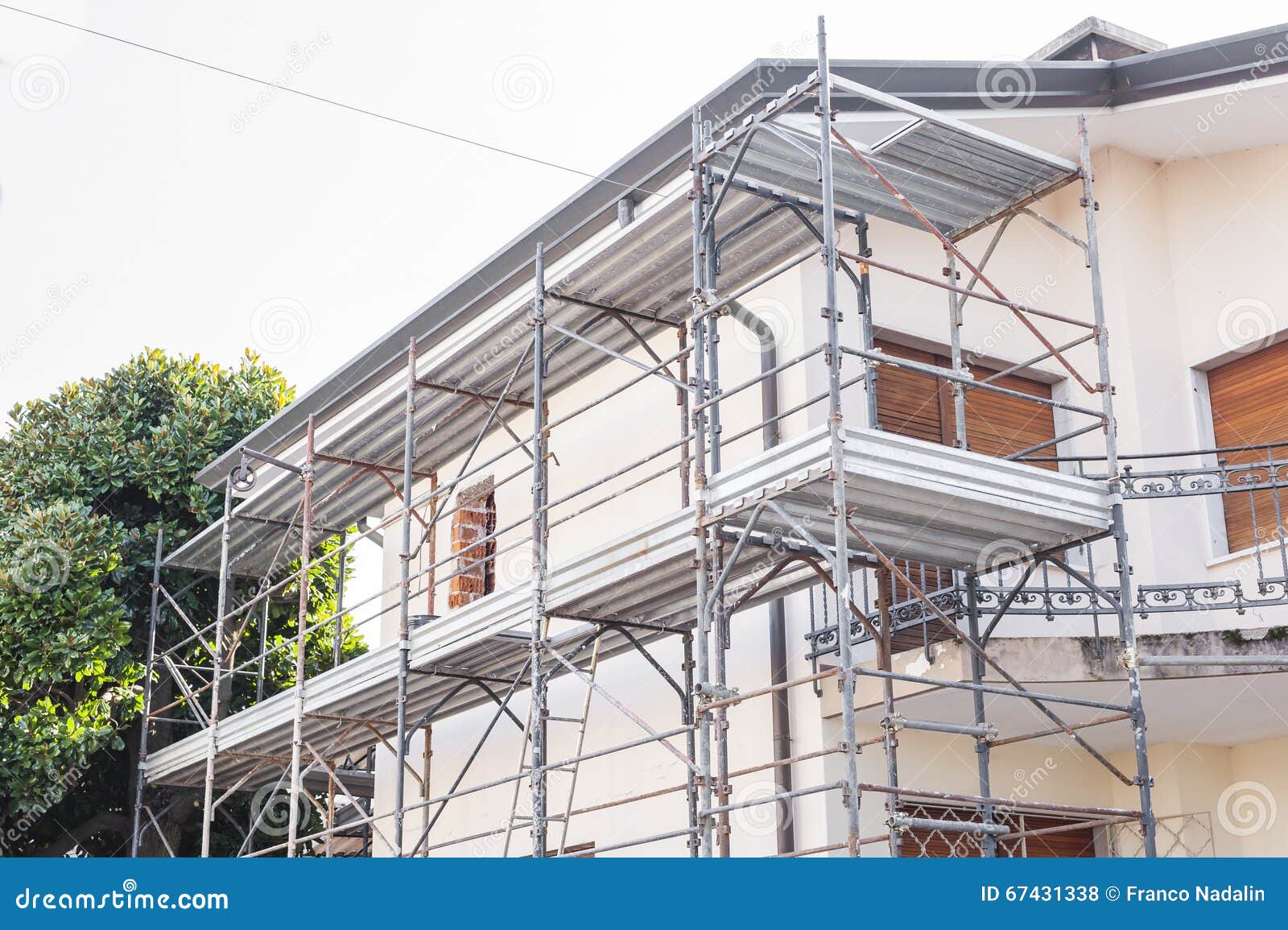 House and scaffold stock photo. Image of estate, erect - 67431338