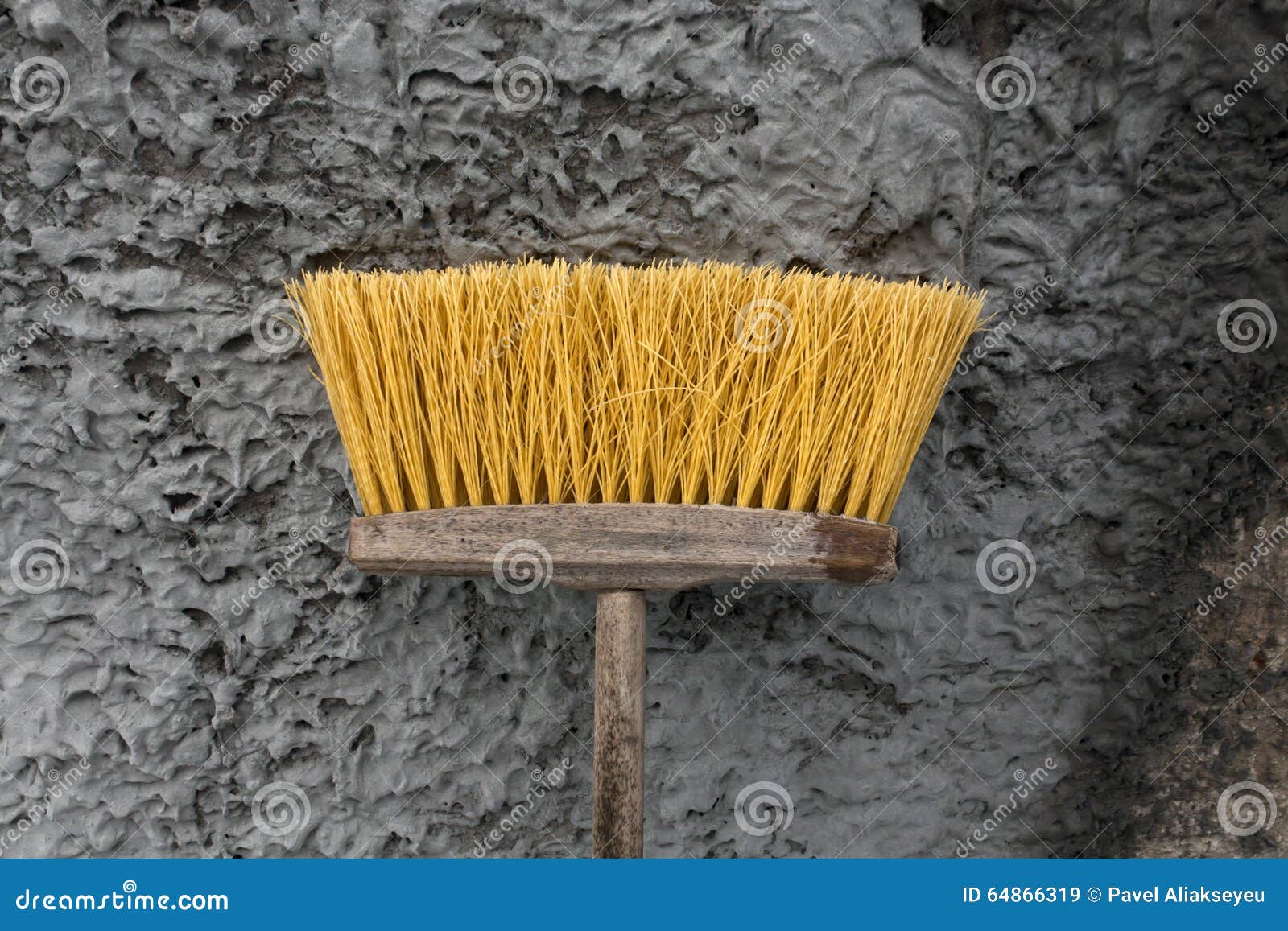House and Street Cleaning Yellow Brush in Front of Wall. Stock Image ...