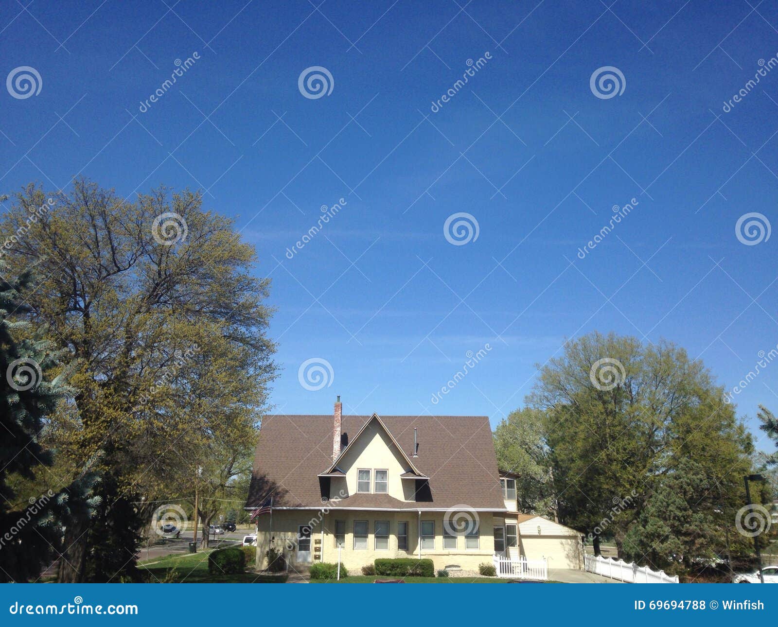 House between two trees stock photo. Image of clean, trees - 69694788