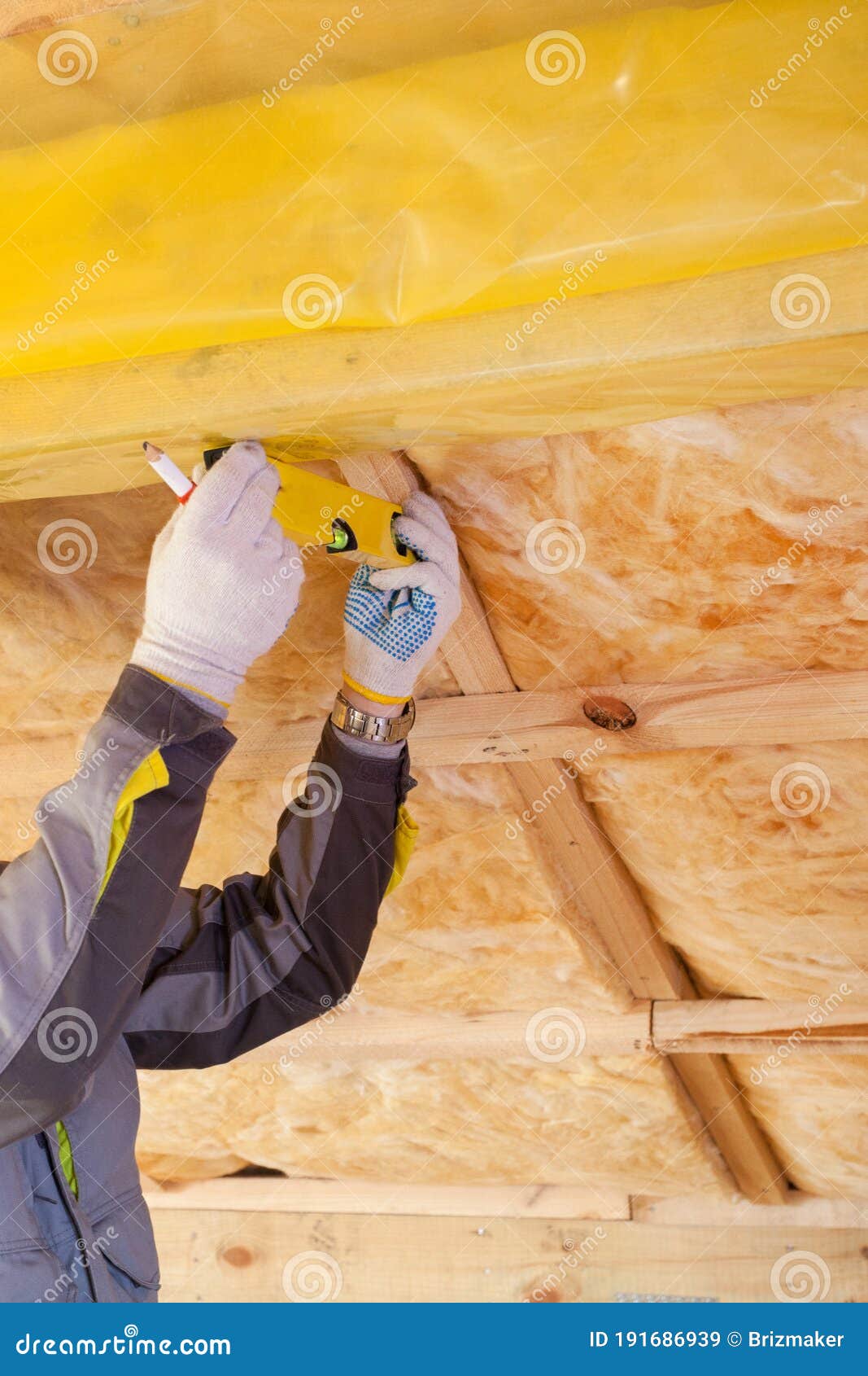 Professional Worker Using Measuring Level, Checking Ceiling Surface ...