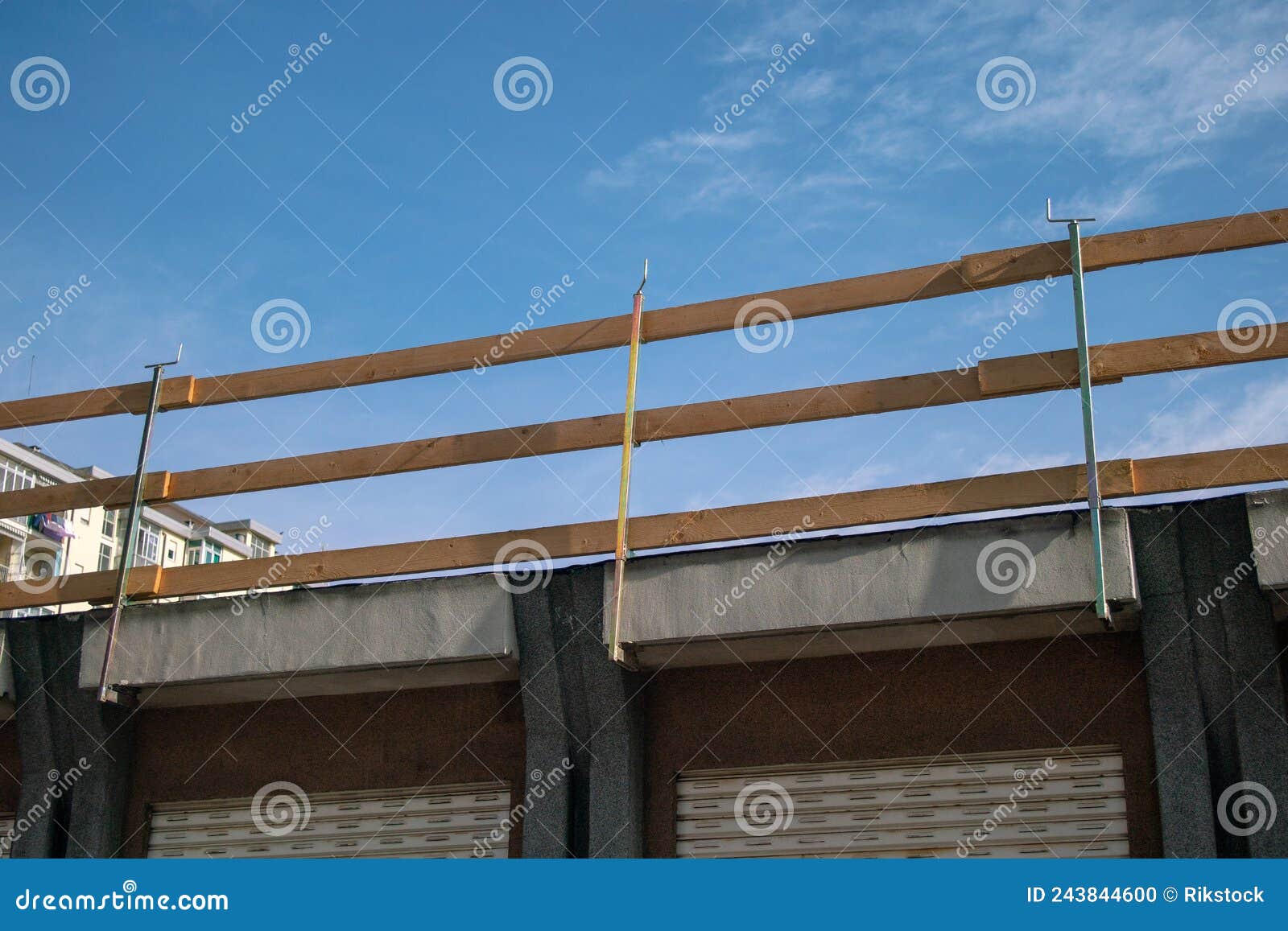 House Under Renovation with Railing for Construction Site on the Facade ...