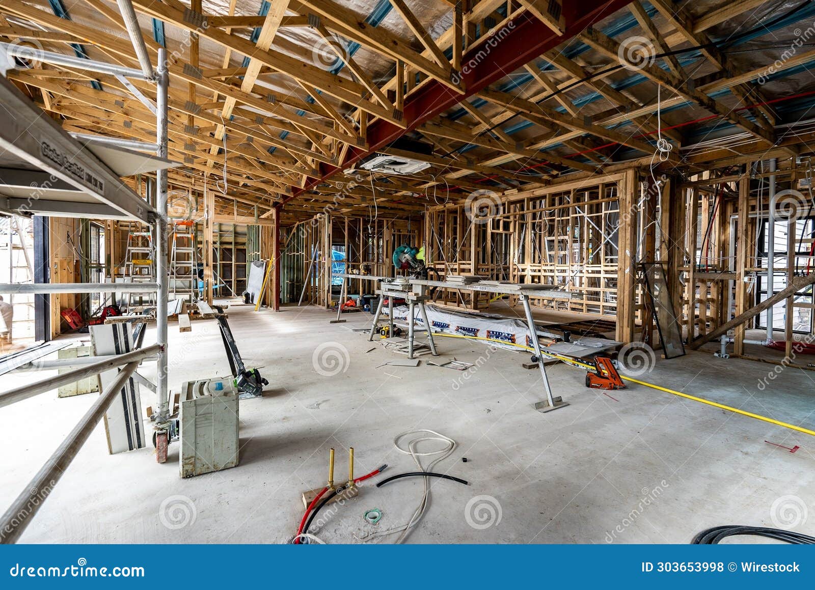 A House Undergoing Renovation Is Surrounded By An Extensive Scaffolding ...