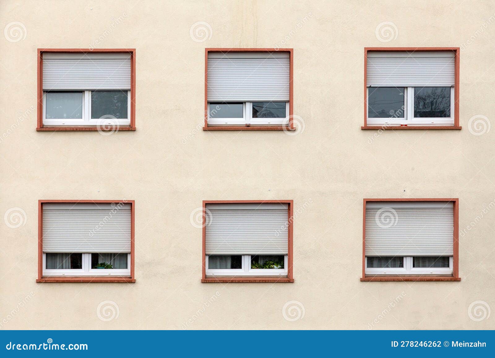 House Wall with Windows with Partly Closed Plastic Shutter Stock Photo ...