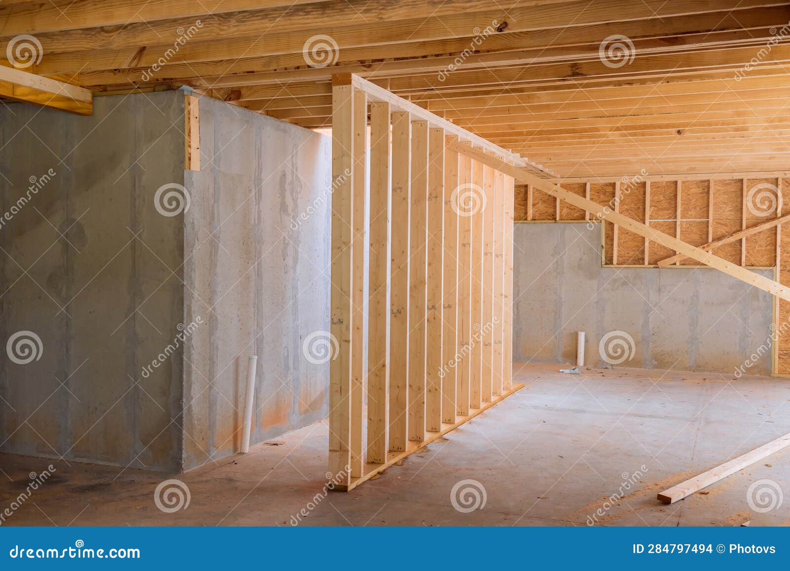 A House with Wooden Framework Frame that is Under Construction is ...