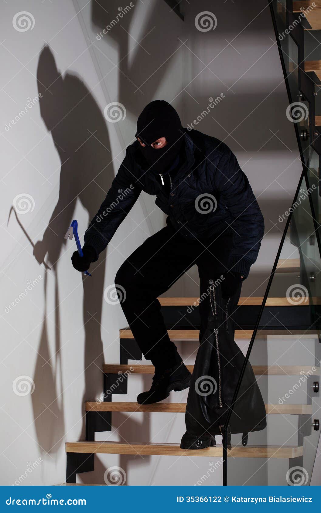 Burglar creeping on stairs stock photo. Image of housebreaker - 35366122